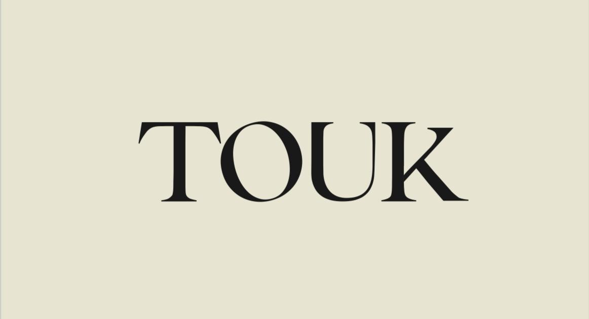 ABOUT | TOUK